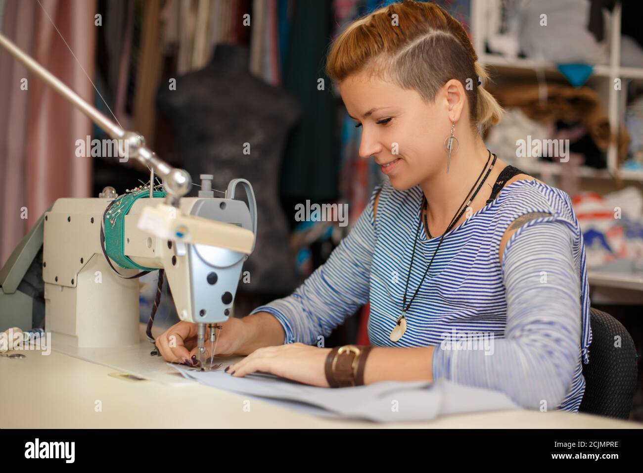 Beautiful blonde woman works on hi-res stock photography and images - Alamy