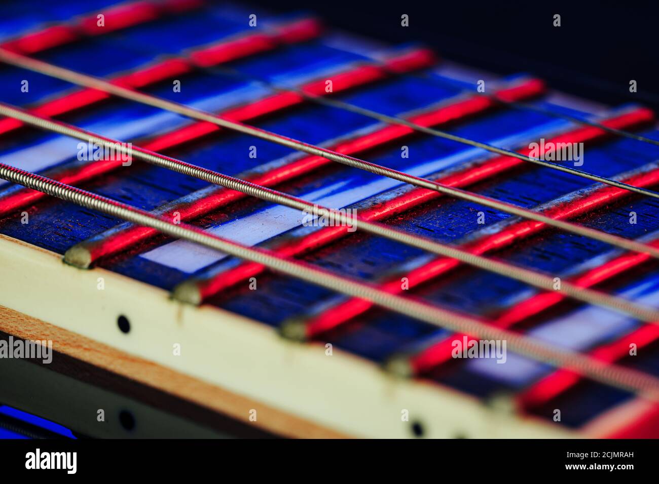 Guitar fingerboard with strings close up photo Stock Photo - Alamy
