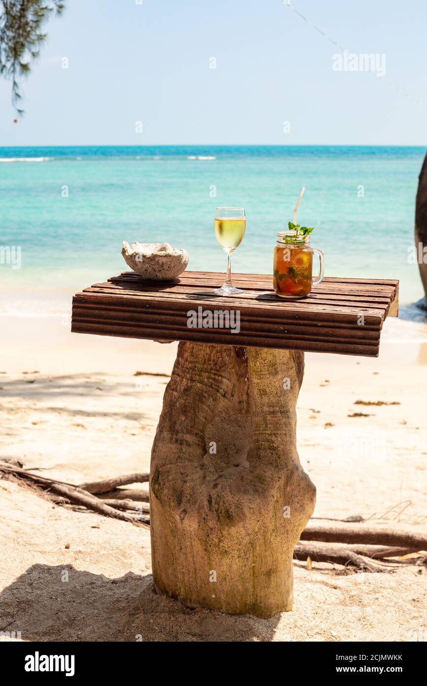 wooden table at a beach bar with turquoise water Ko Samui, thailand ...