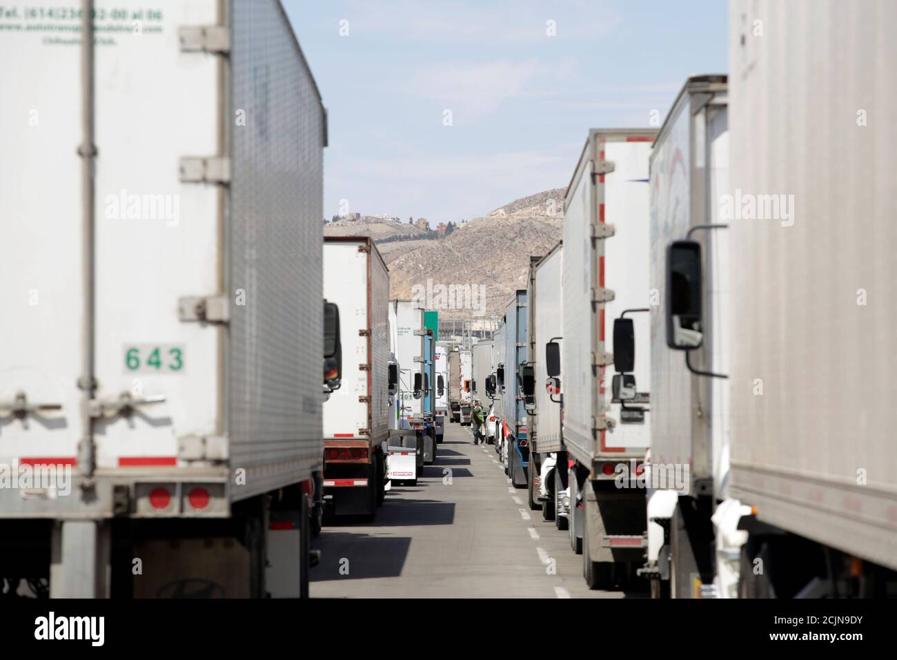Mexico border crossing trucks hi-res stock photography and images - Alamy