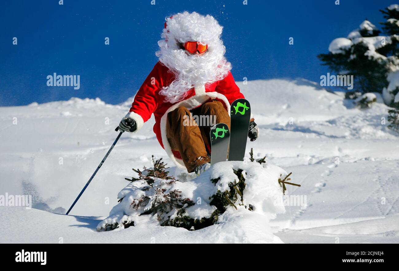 Santa claus with ski hi-res stock photography and images - Alamy