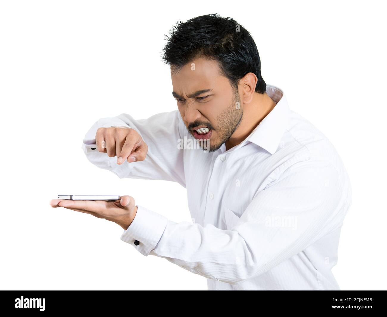 Closeup portrait of an angry young man shouting while on phone isolated ...