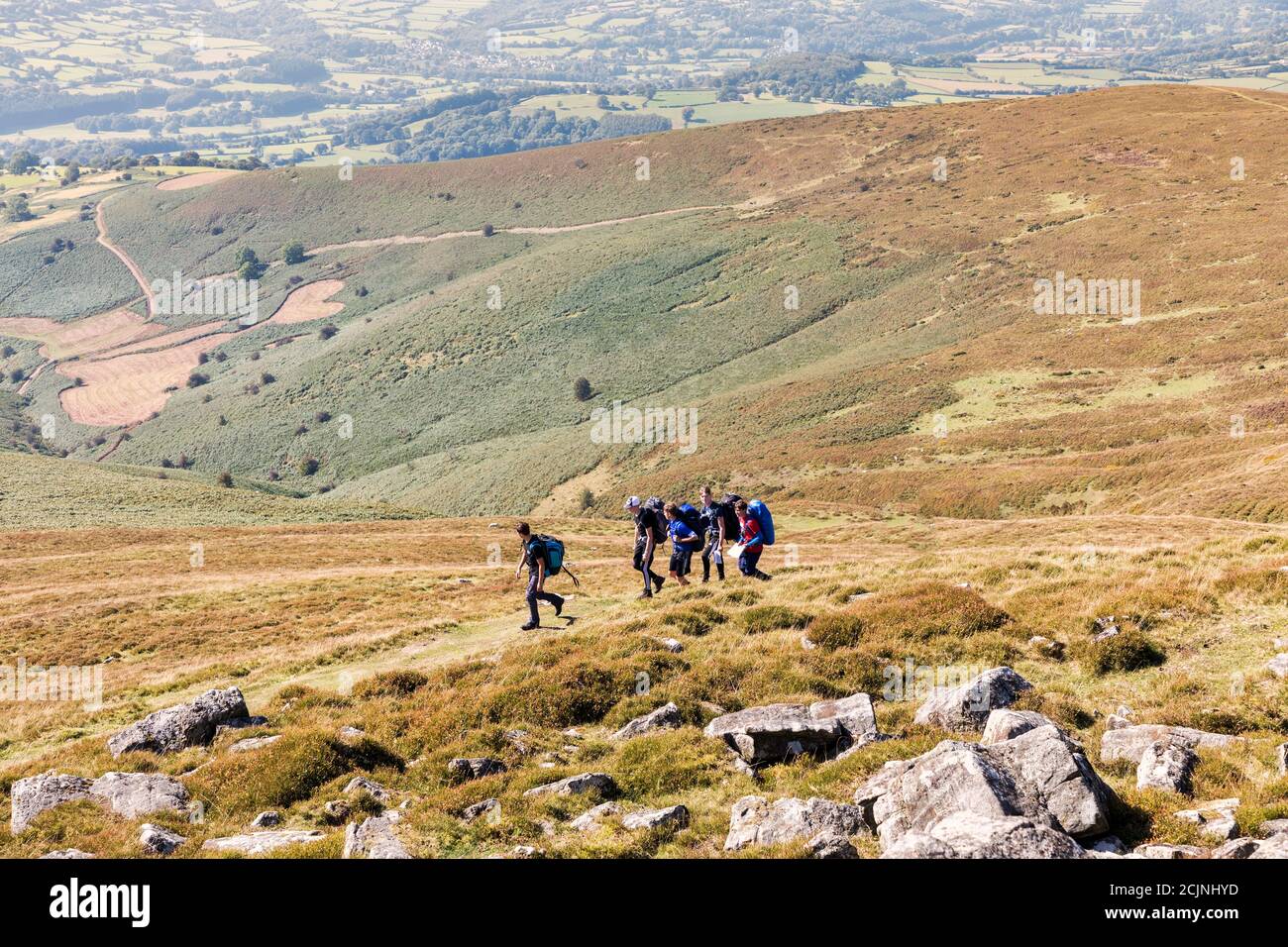 Group walking on the Sugar Loaf, Wales, UK Stock Photo - Alamy