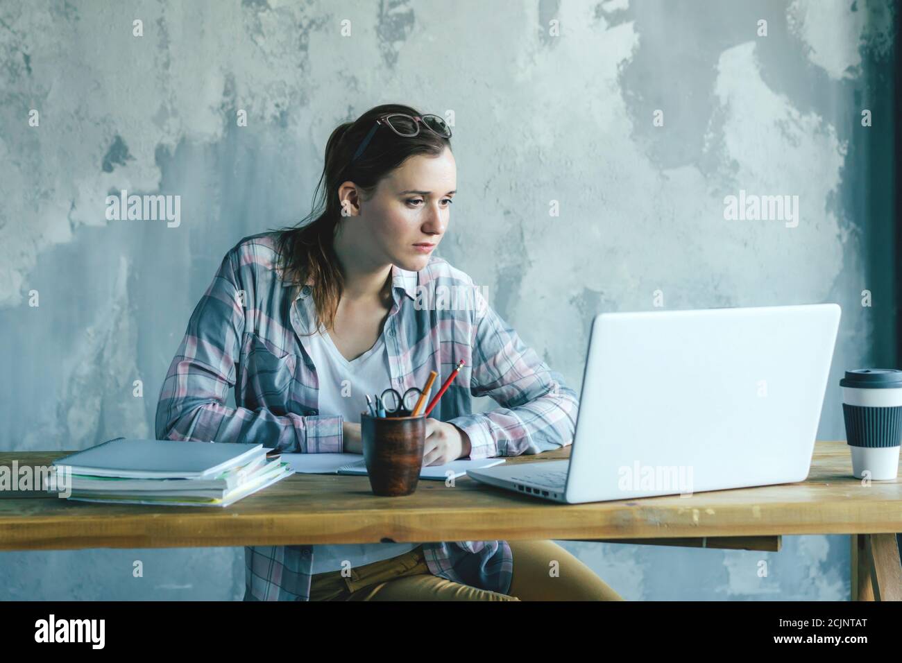 female student with laptop on campus Stock Photo - Alamy