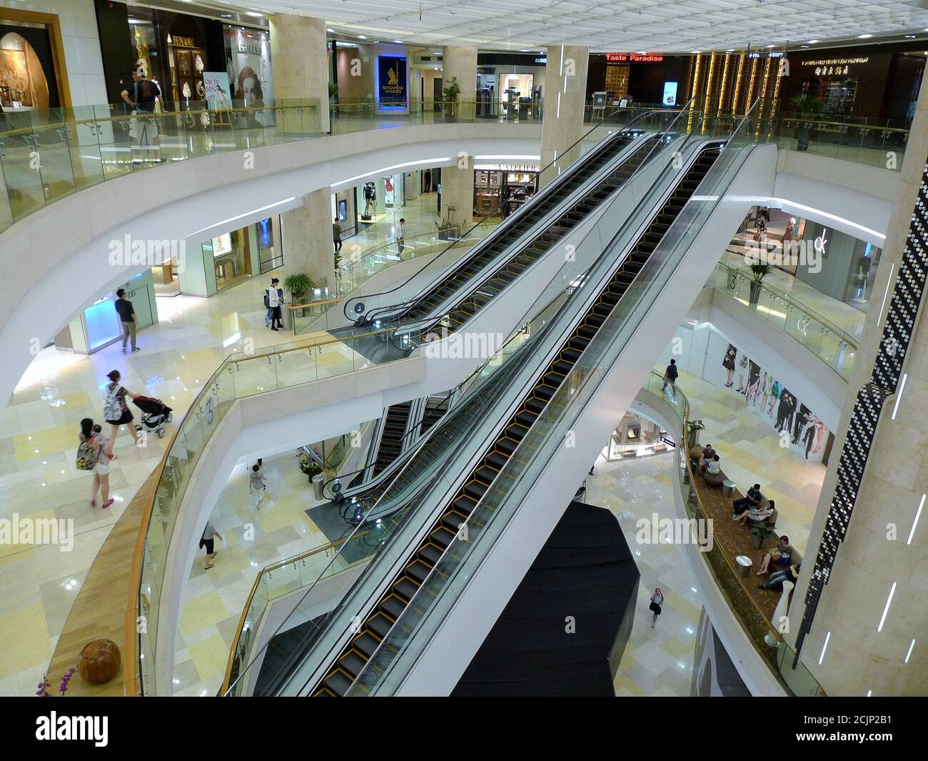 INTERIOR OF A LUXURY SHOPPING CENTER ON THE ORCHARD ROAD Stock Photo ...