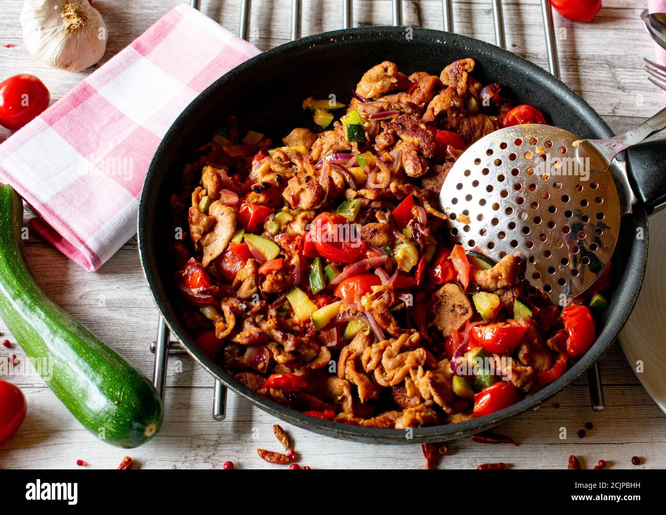 low carb pan dish with meat and mediterranean vegetables Stock Photo ...