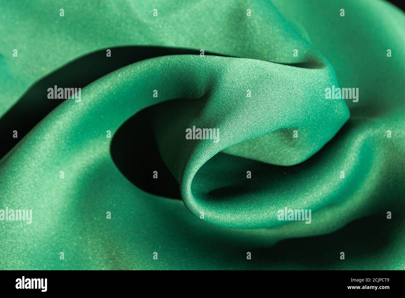 The texture of the green fabric is wrinkled Stock Photo - Alamy