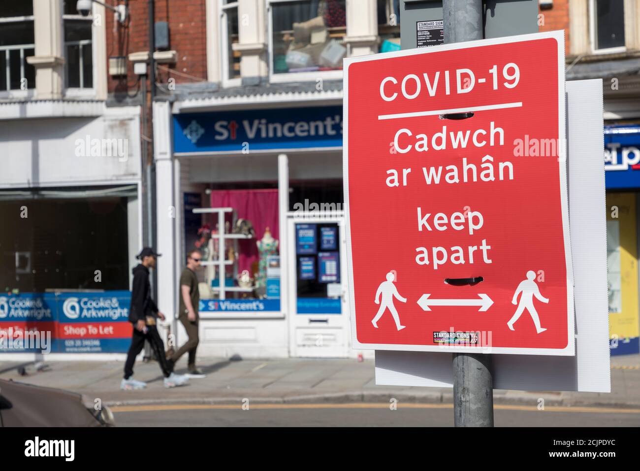 Pandemic keep apart warning sign, Newport, Wales, UK Stock Photo - Alamy