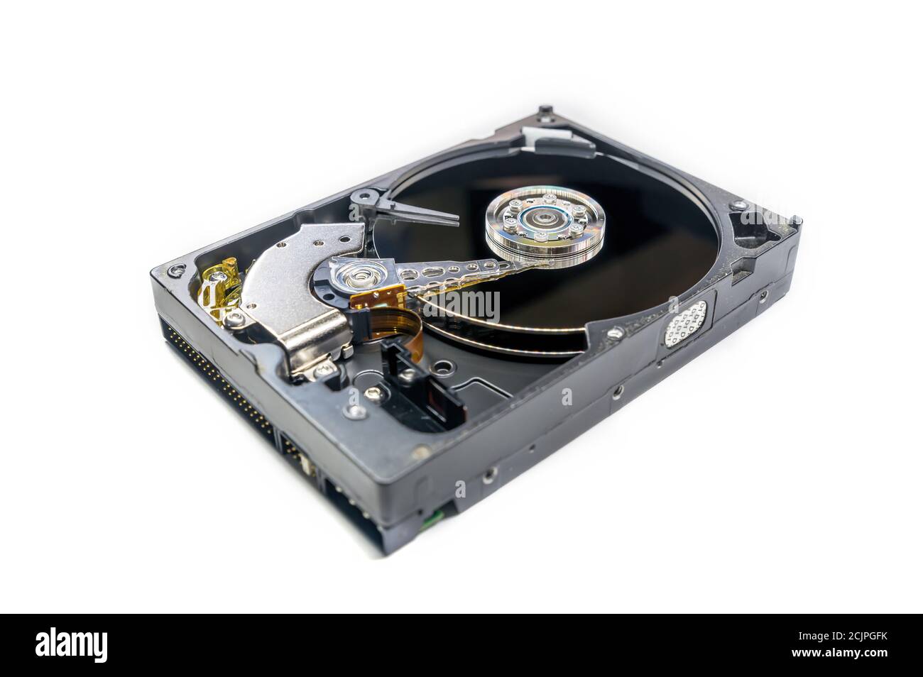 Old-fashioned, open, mechanical harddisc drive, isolated on a white ...