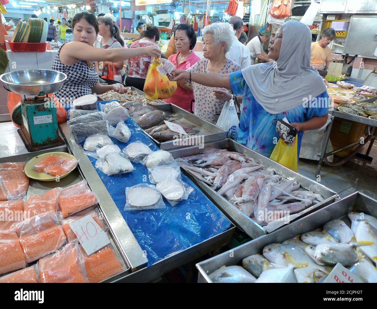 PEOPLE INSIDE THE FISH MARKET Stock Photo - Alamy