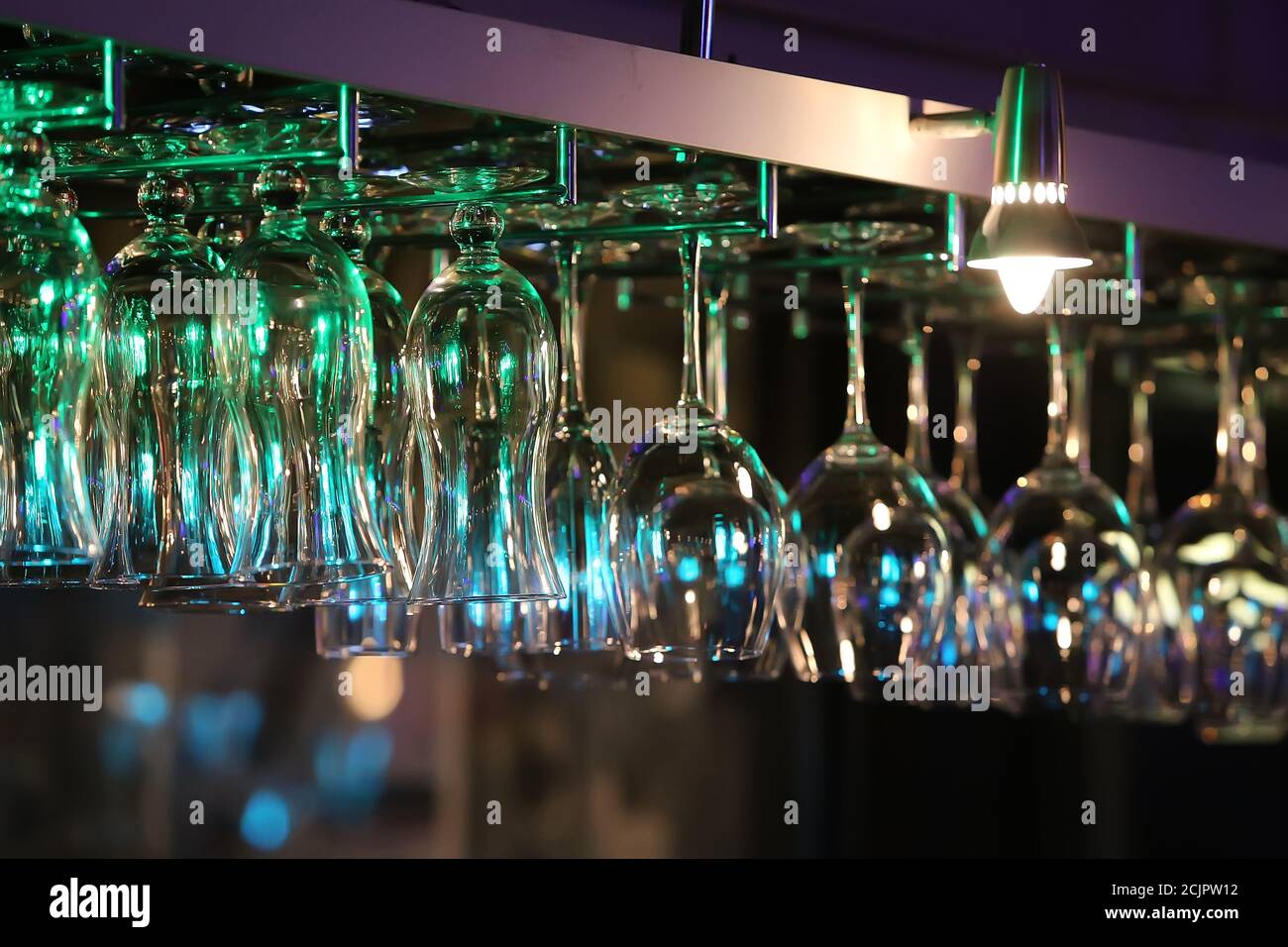 Hanging over bar hi-res stock photography and images - Alamy