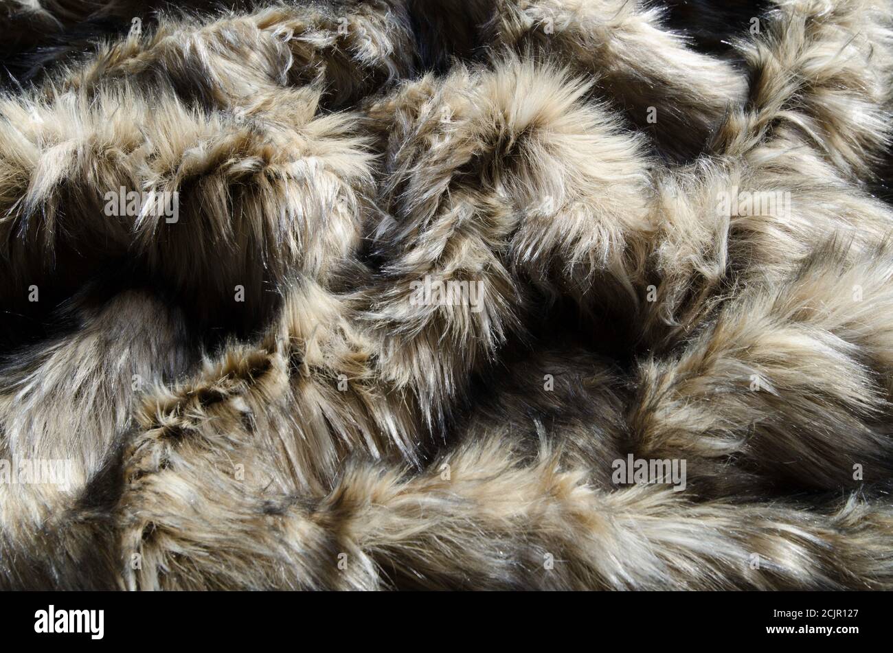 Wolf fake fur texture, abstract background Stock Photo - Alamy