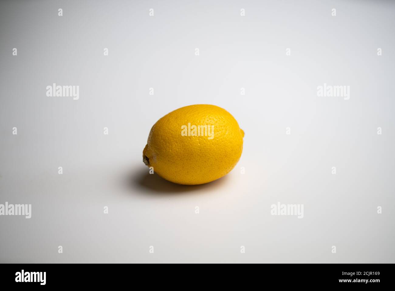 yellow lemon flat lay white background Stock Photo - Alamy