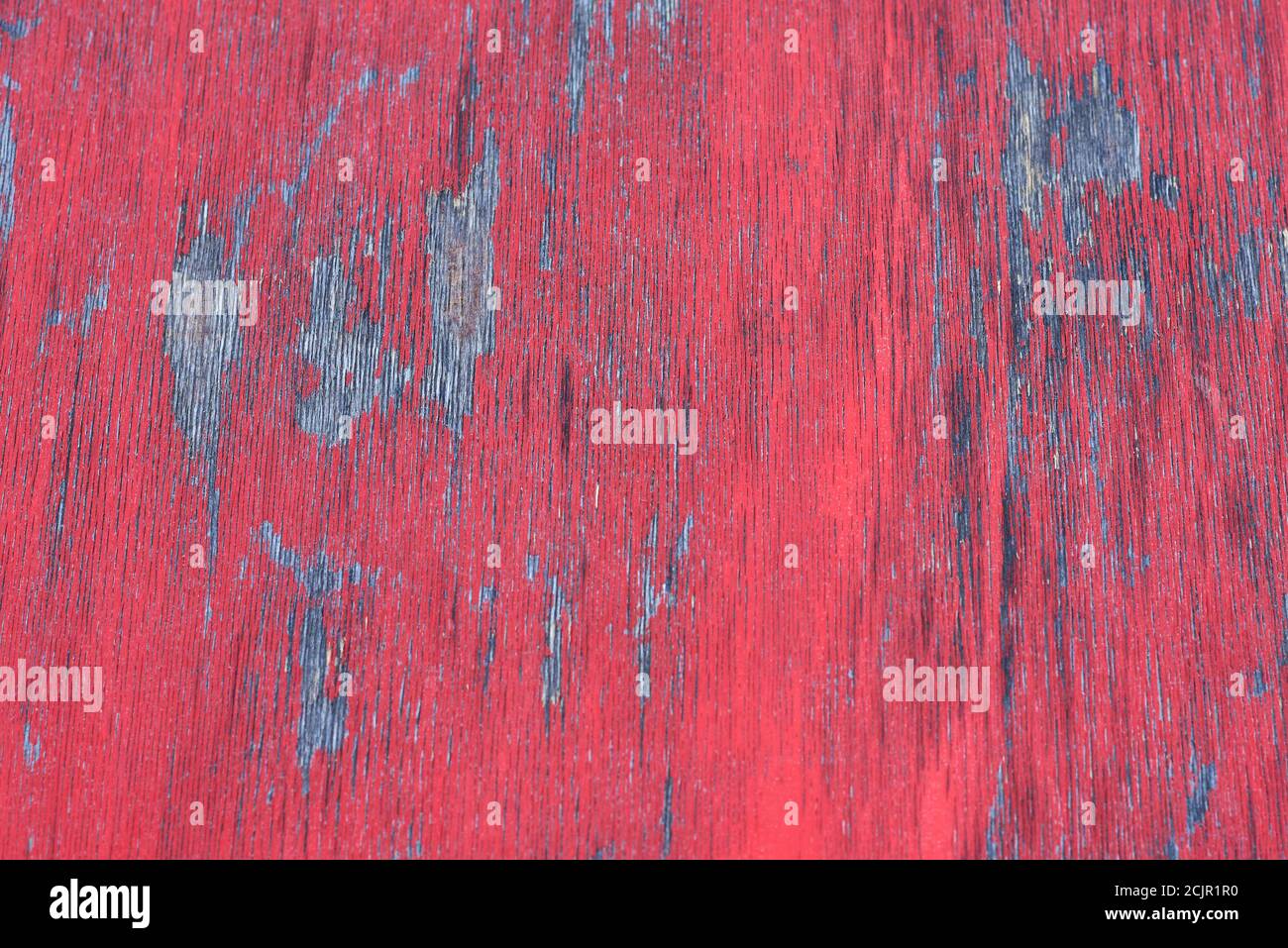 Peeling red paint on a wooden surface, texture, creative background ...