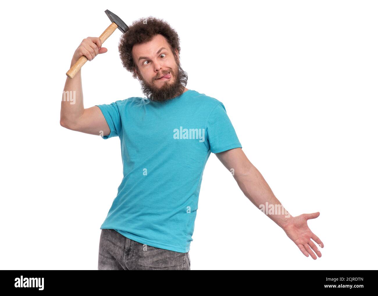 Crazy bearded man with hammer Stock Photo - Alamy