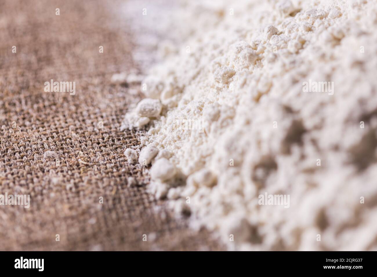 White flour on textile background texture photo Stock Photo - Alamy