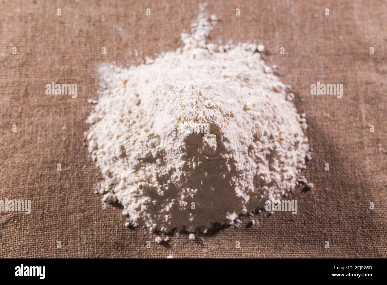 White flour on textile background texture photo Stock Photo - Alamy