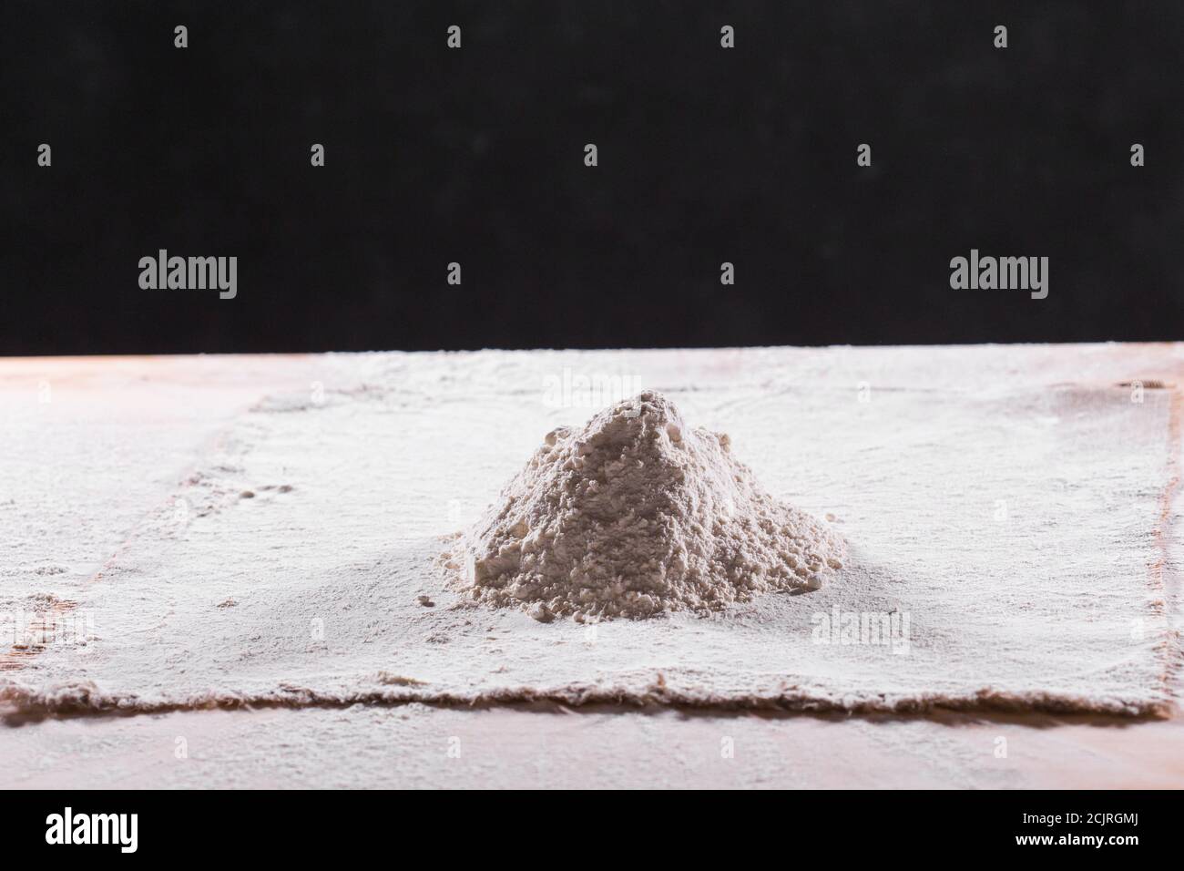 White flour on textile background texture photo Stock Photo - Alamy