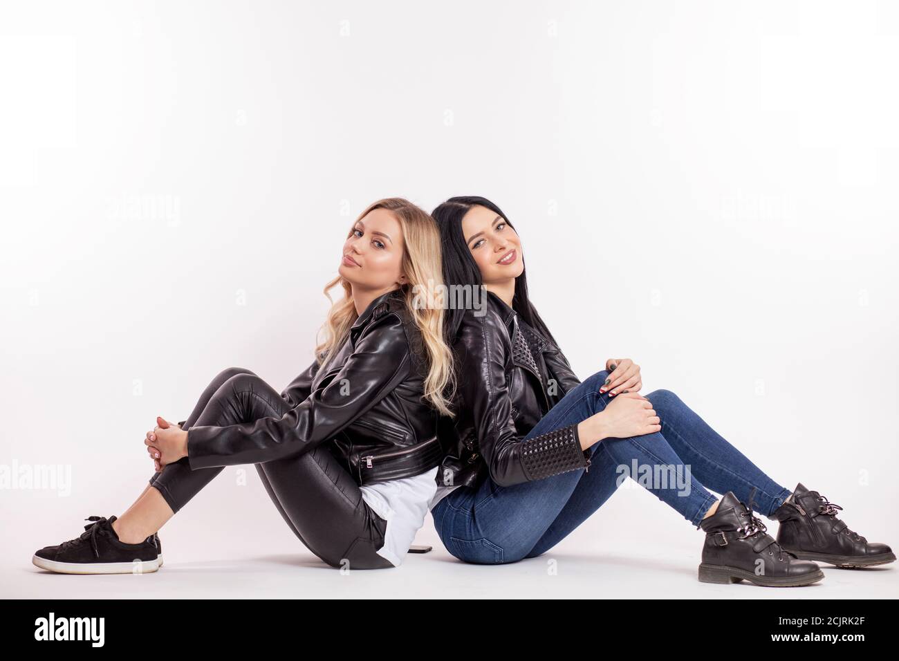 Women Friends Leaning On Each Other High Resolution Stock Photography ...
