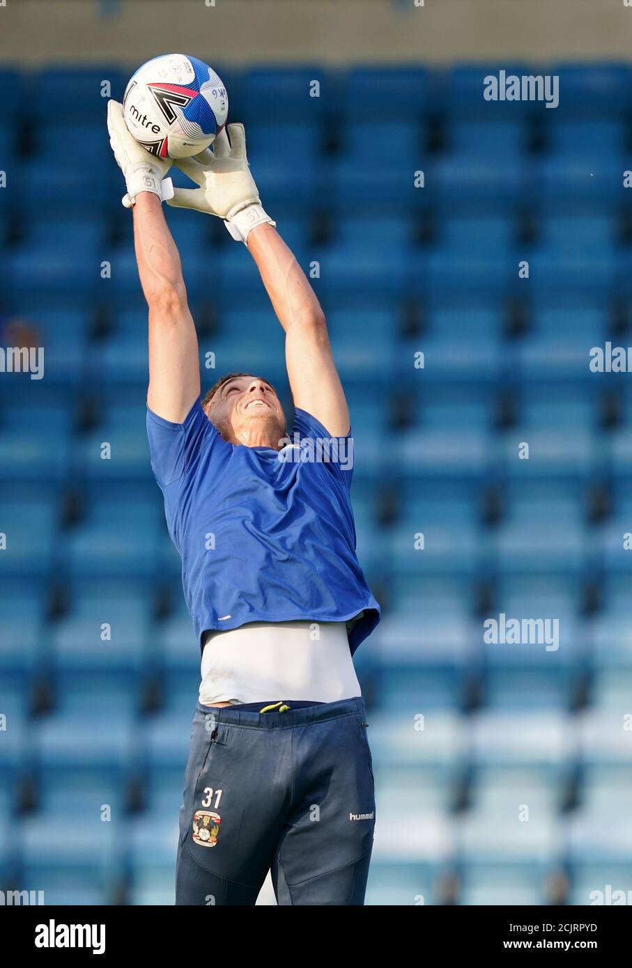 Coventry City goalkeeper Tom Billson warming up before the Carabao Cup ...