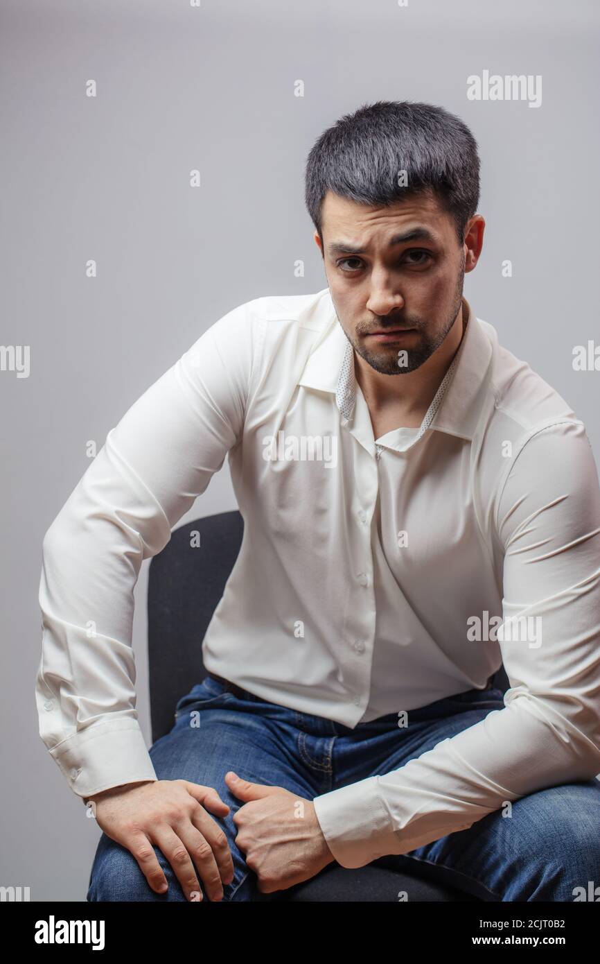 Sitting student hands raised chair hi-res stock photography and images ...