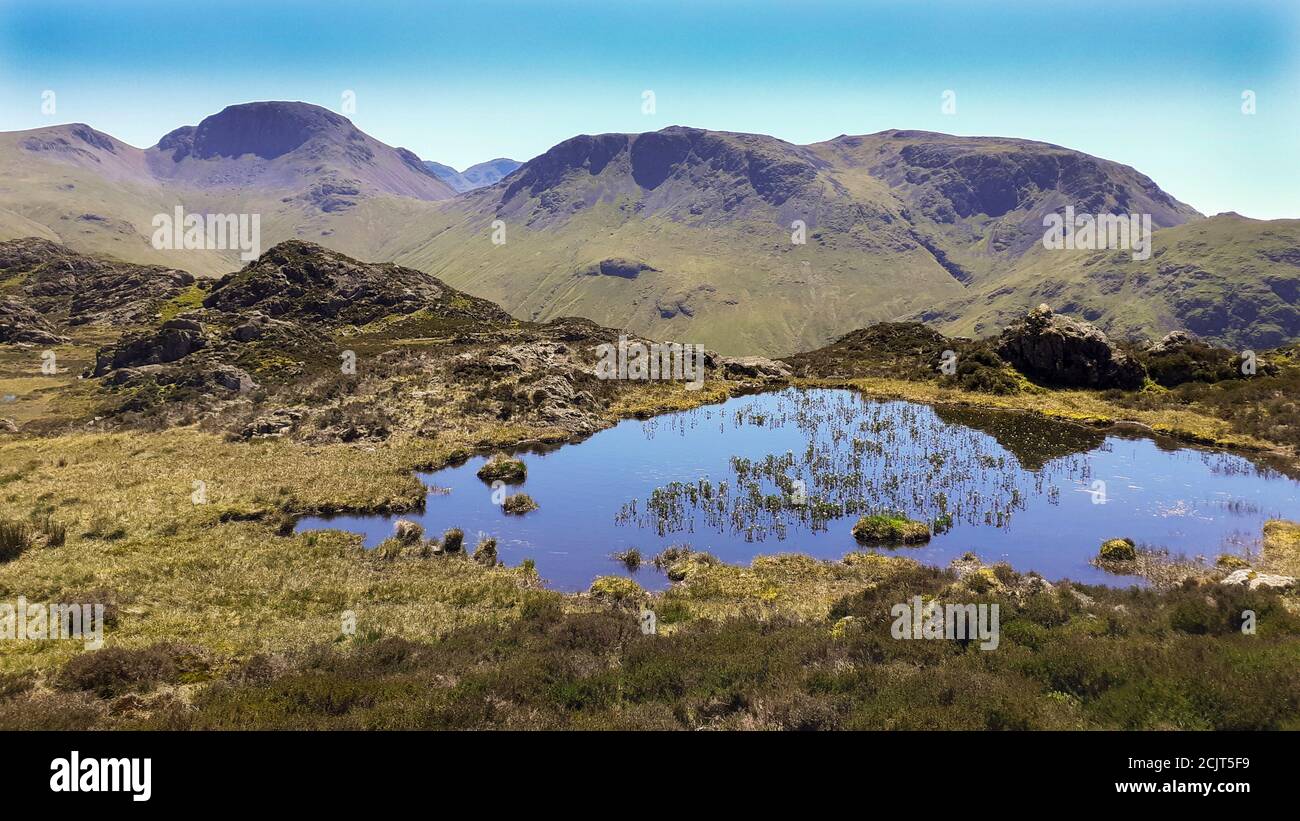 Innominate Tarn on Haystacks in the Lake District, UK looking towards ...