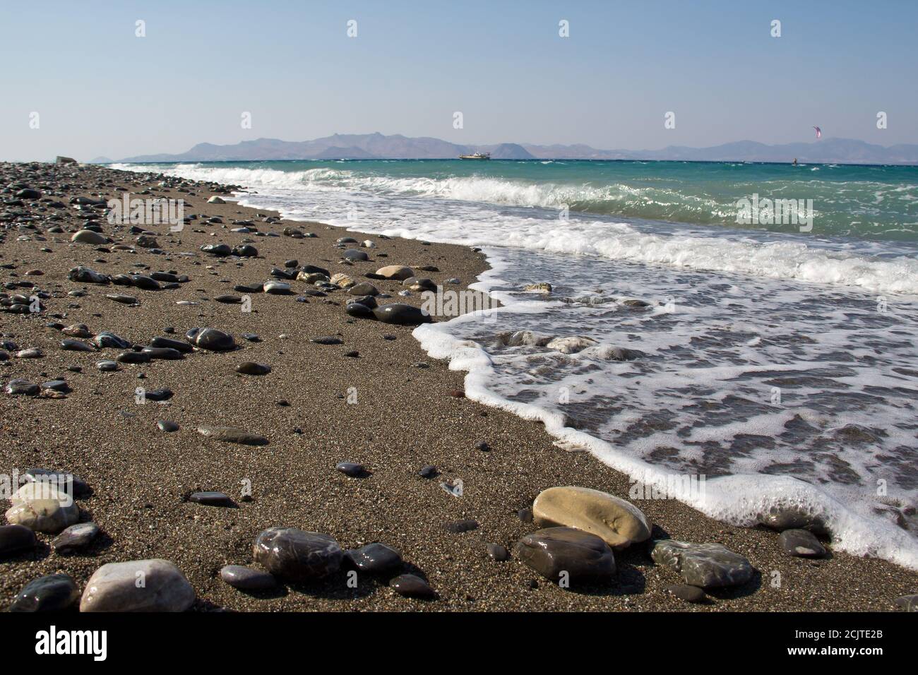 Sunny scenery of a sandy beach Stock Photo - Alamy