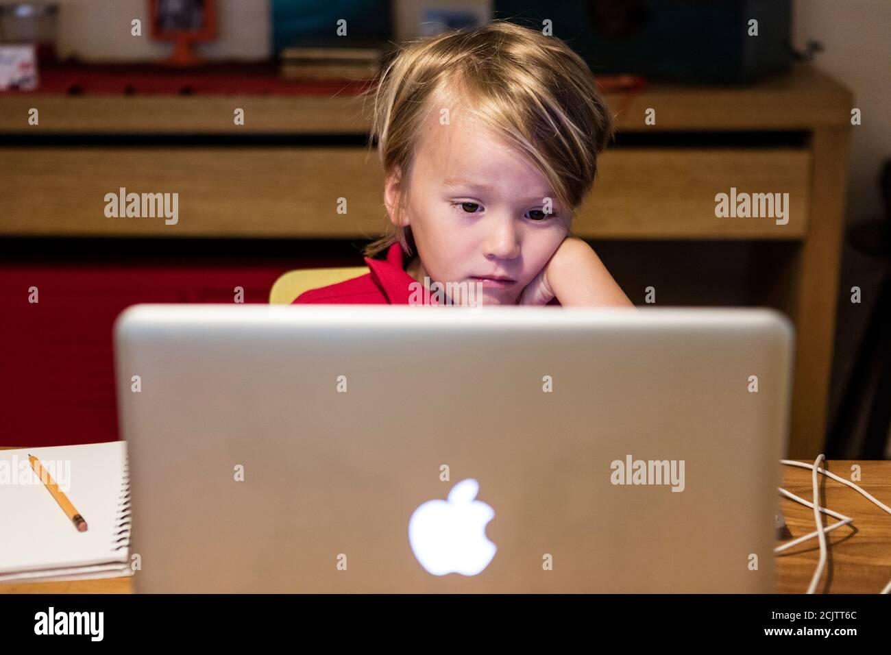 Bored preschool child with laptop High Resolution Stock Photography and ...