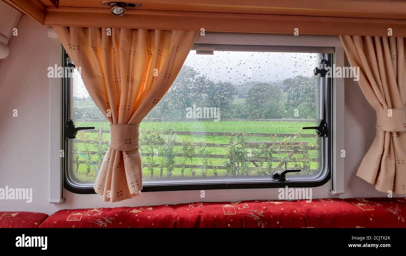 Rain on a caravan window Stock Photo - Alamy
