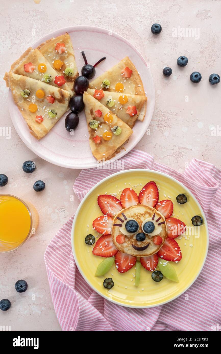 Funny Flower Pancake with berries for kids Stock Photo - Alamy