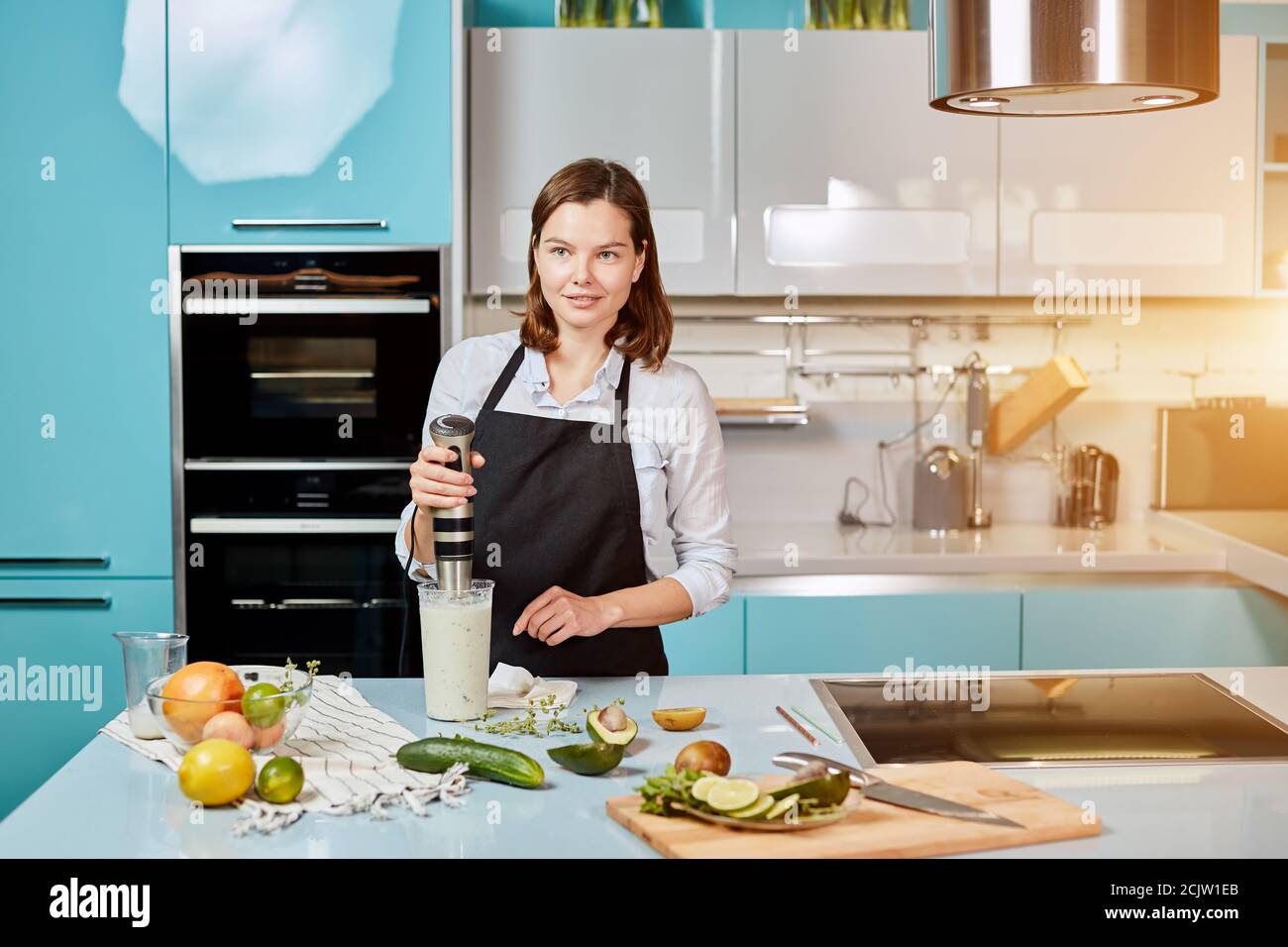 gorgeous woman is good at cooking. the secret of cooking skills Stock ...