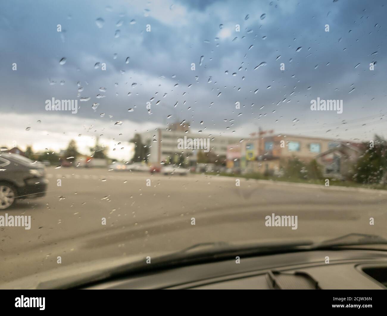 Rainy city view from window hi-res stock photography and images - Alamy