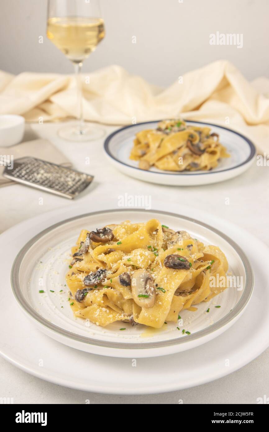 Homemade Italian fettuccine pasta with mushrooms and parmesan ...