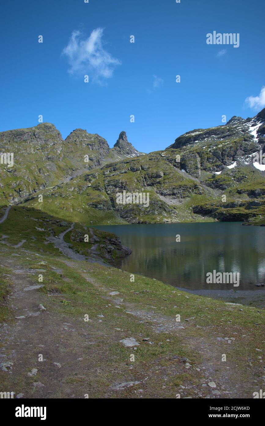 Pretty little lake at mount Pizol in Switzerland Stock Photo - Alamy