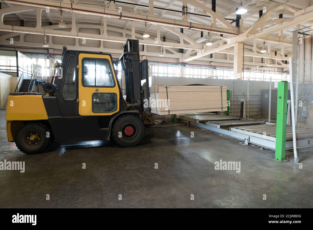 forklift load panels on production line Stock Photo - Alamy