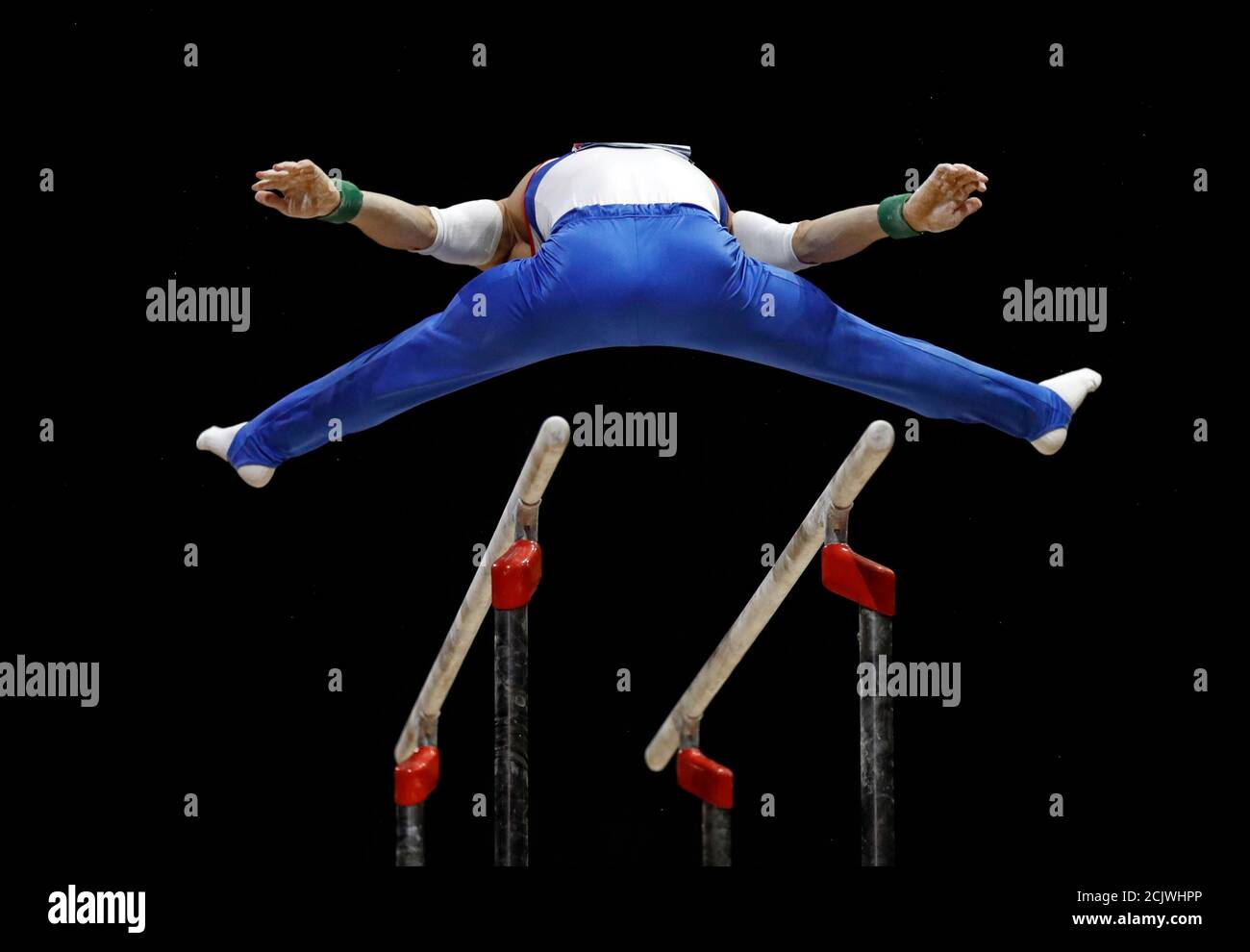 Artistic gymnastics mens parallel bars final hi-res stock photography ...