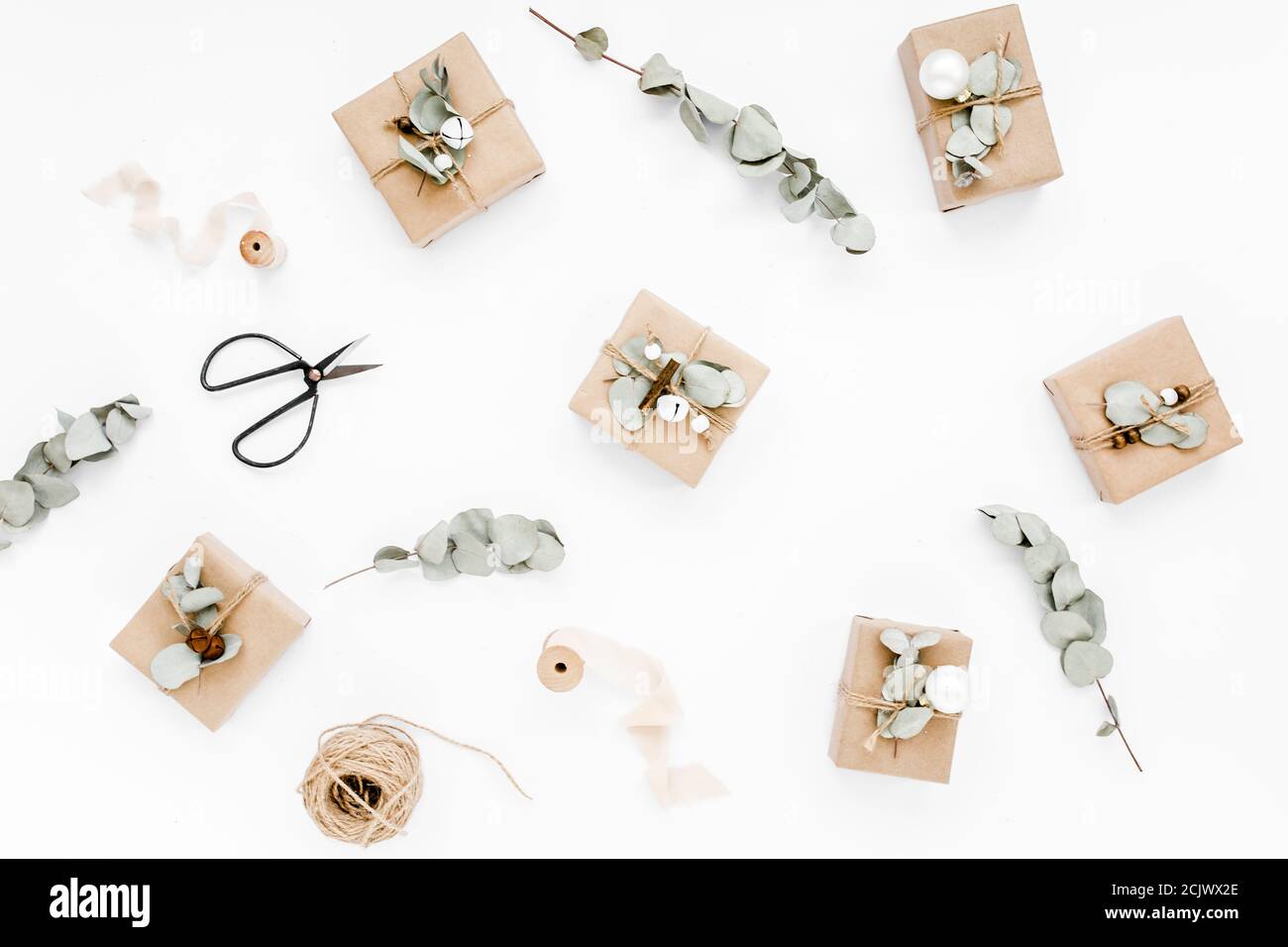 Christmas pattern, texture made in of craft boxes and green branches in ...