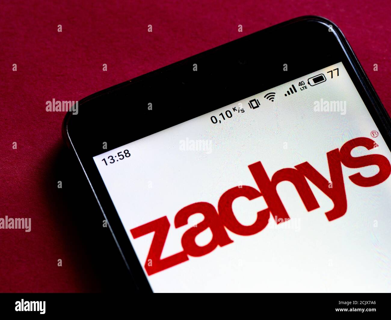 In this photo illustration a Zachys logo seen displayed on a smartphone ...