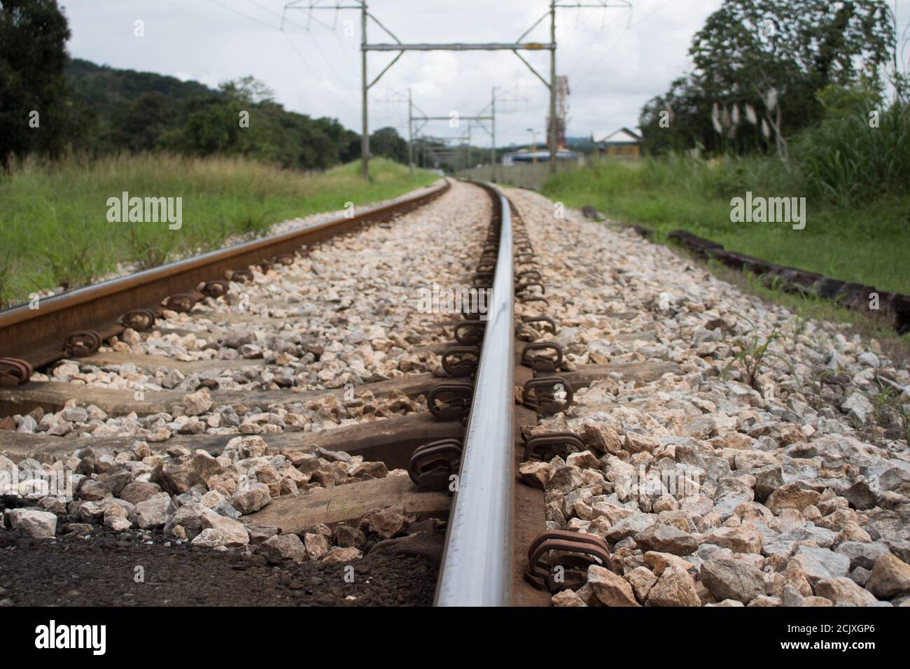 Railroad tracks lost in the curve Stock Photo - Alamy