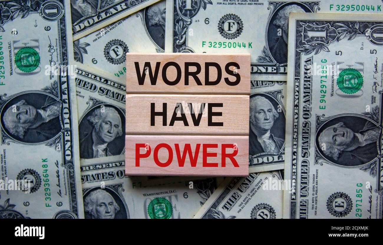Wooden blocks form the words 'words have power' on beautiful background ...