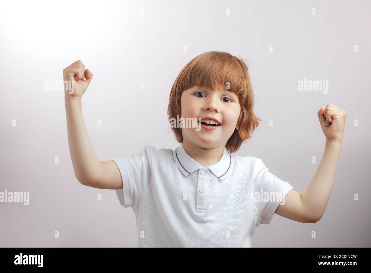 sport and kids. little sportsman is celebrating the victory. happiness ...