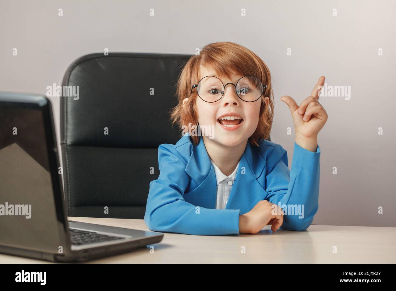 ginger positive kid is showing his age. close up photo. studio shot ...