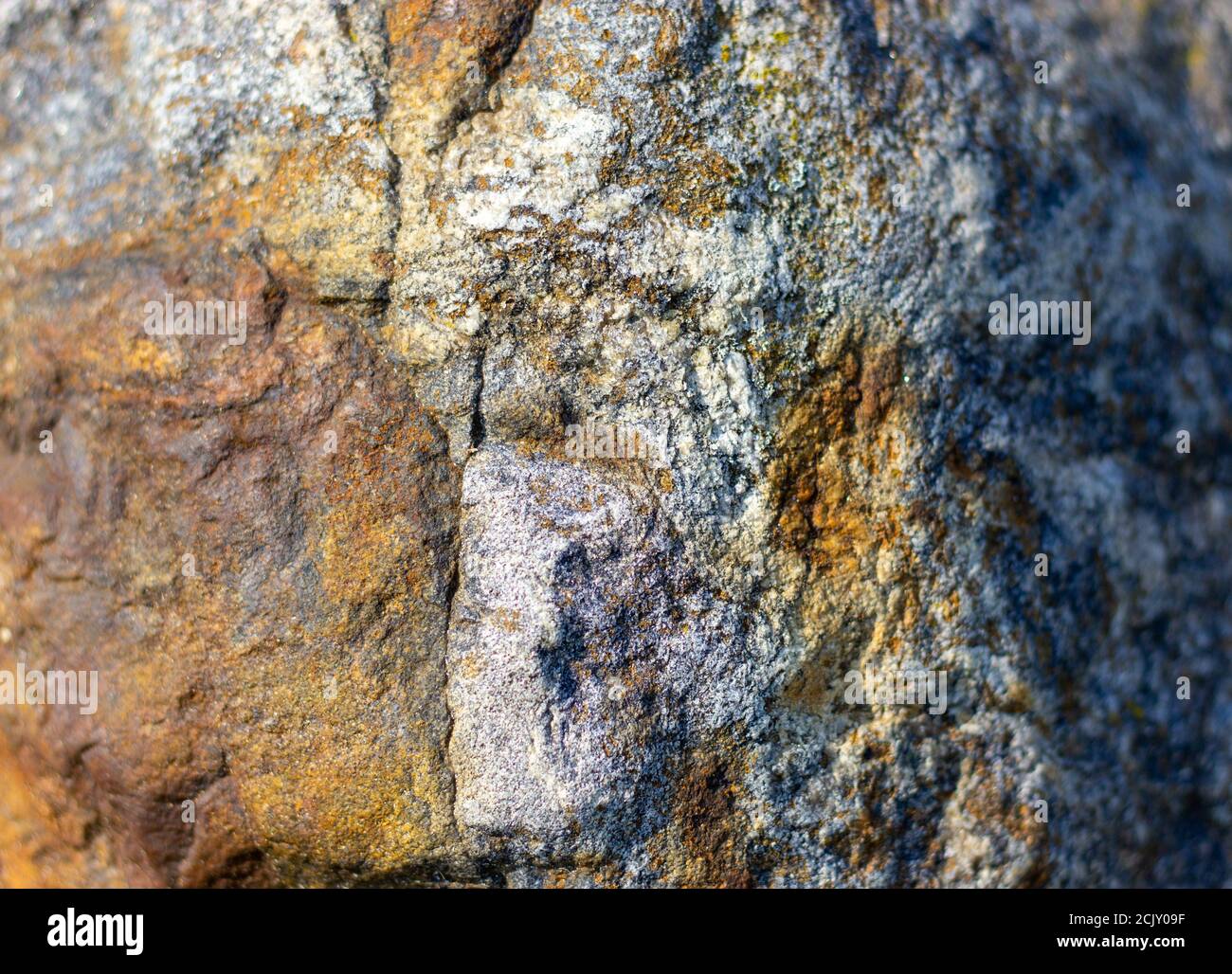 Unpolished granite surface. Warm sunlight. Beautiful background ...