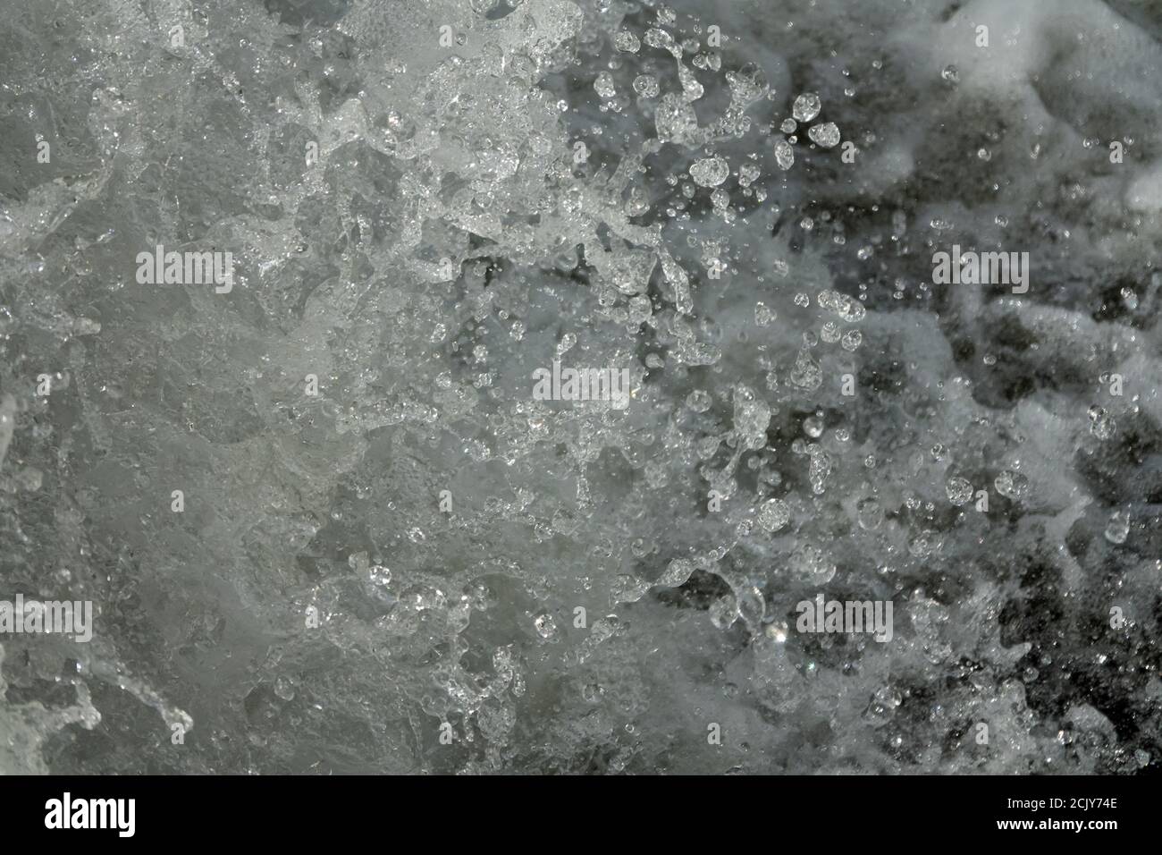 Water splashes from waterfall close-up. Beauty of clear spring water ...