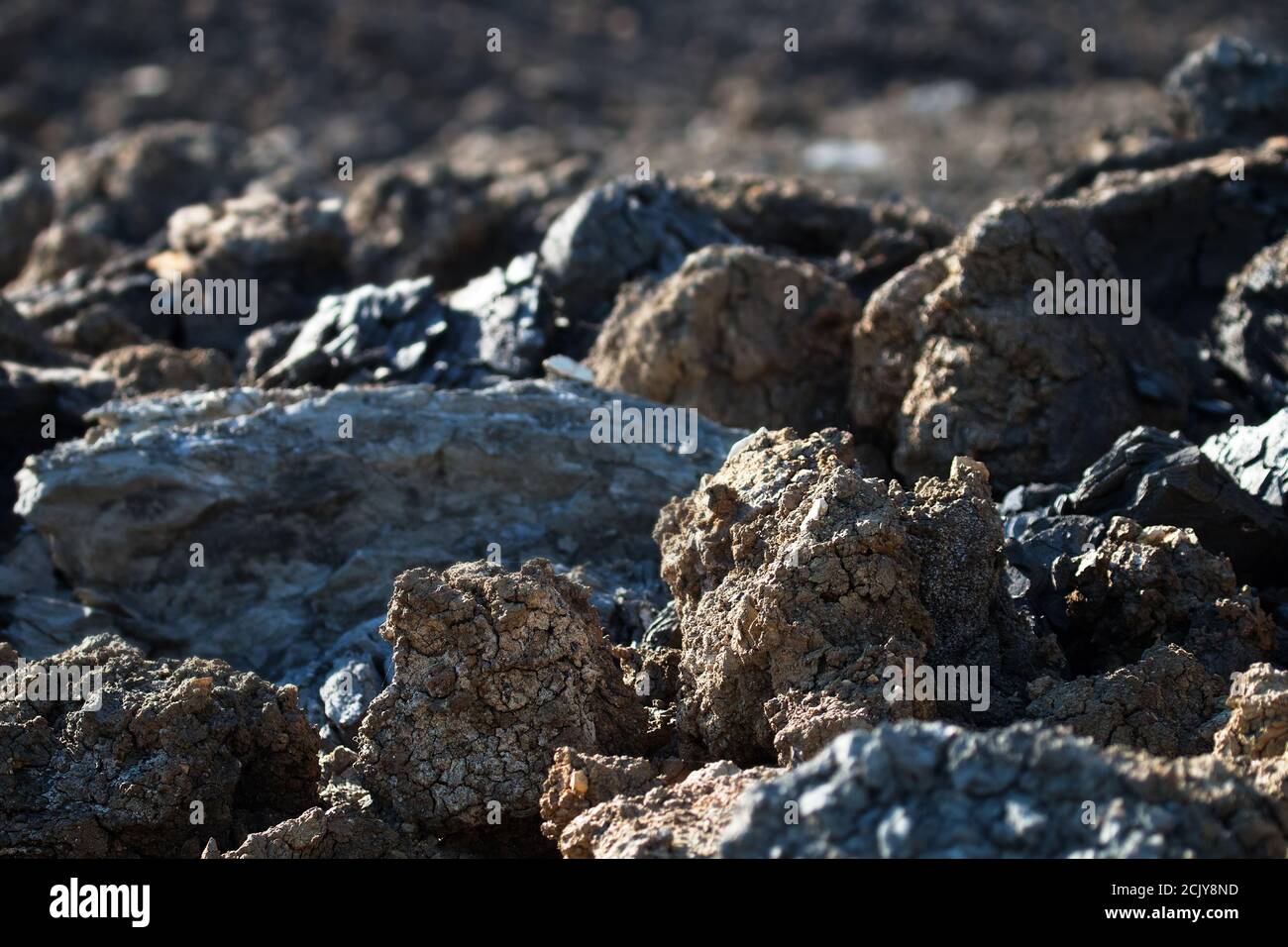 Rough plowing. Dry and clay cracked land unsuitable for agriculture ...