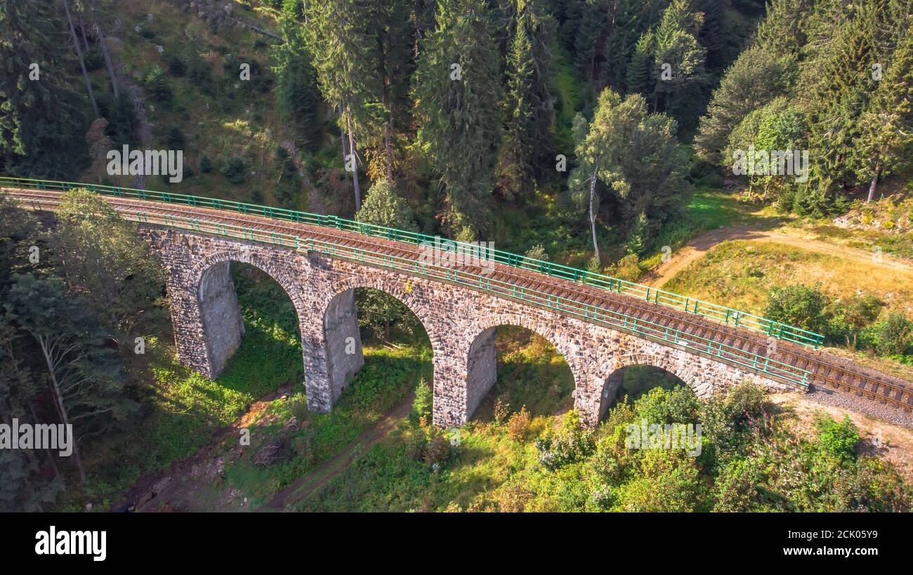 Aerial top view of stone Railway Viaduct in a small village of Pernink ...