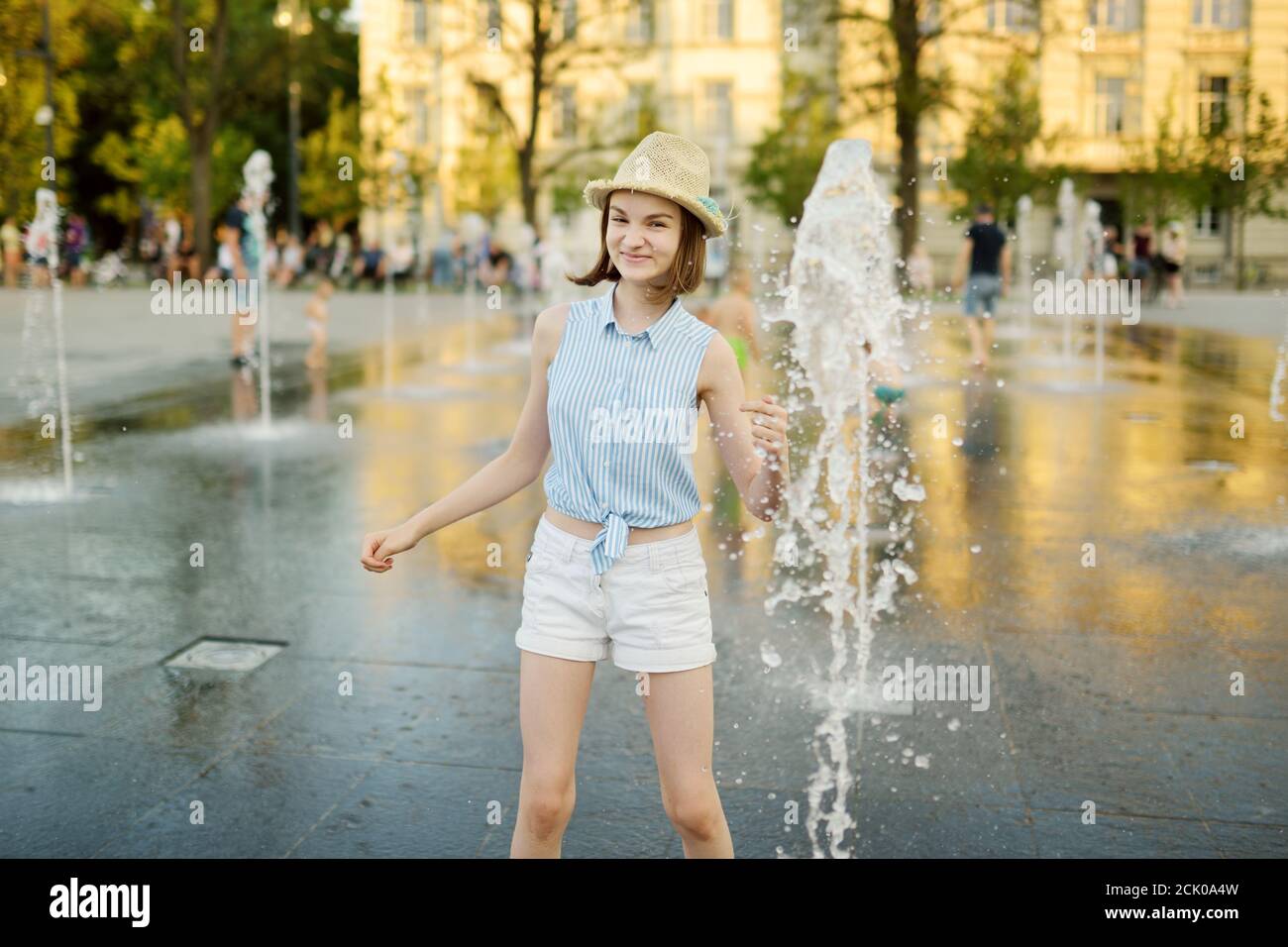 Teen girl in fountain hi-res stock photography and images - Alamy