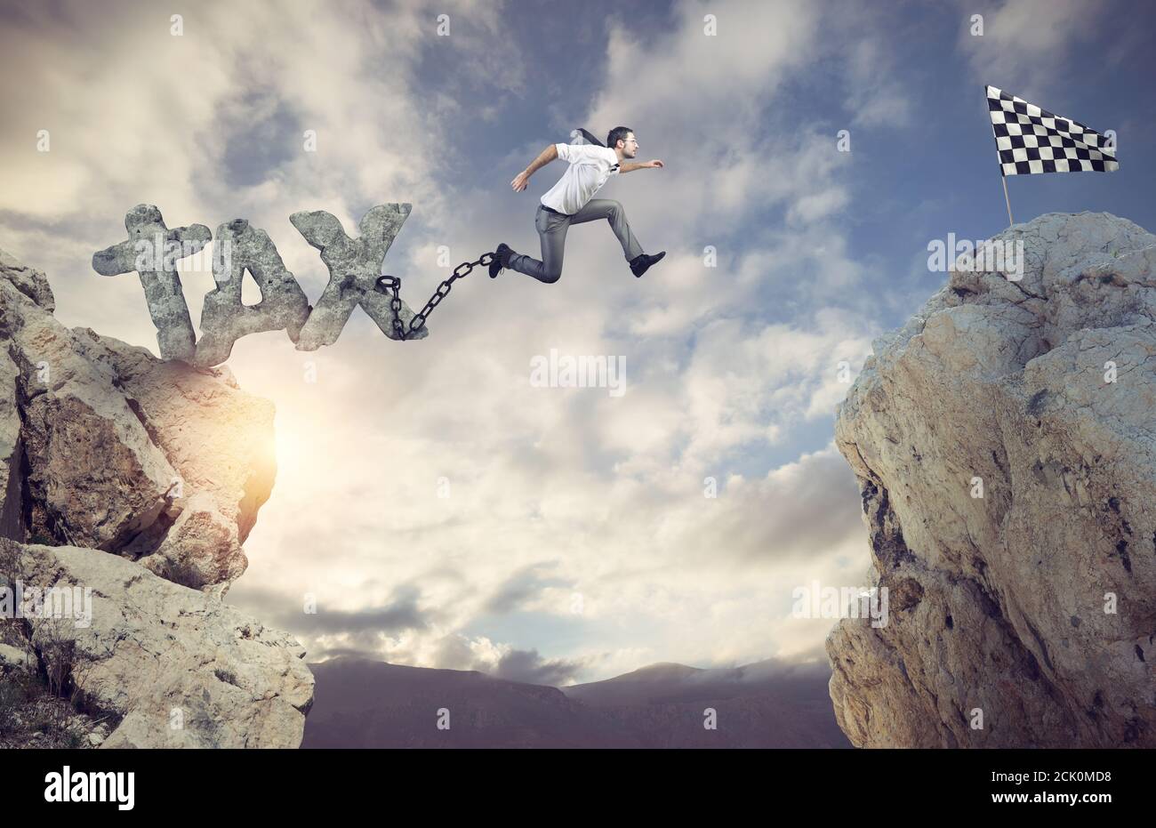 Businessman tries to reaches the flag but he is tied with a strong ...