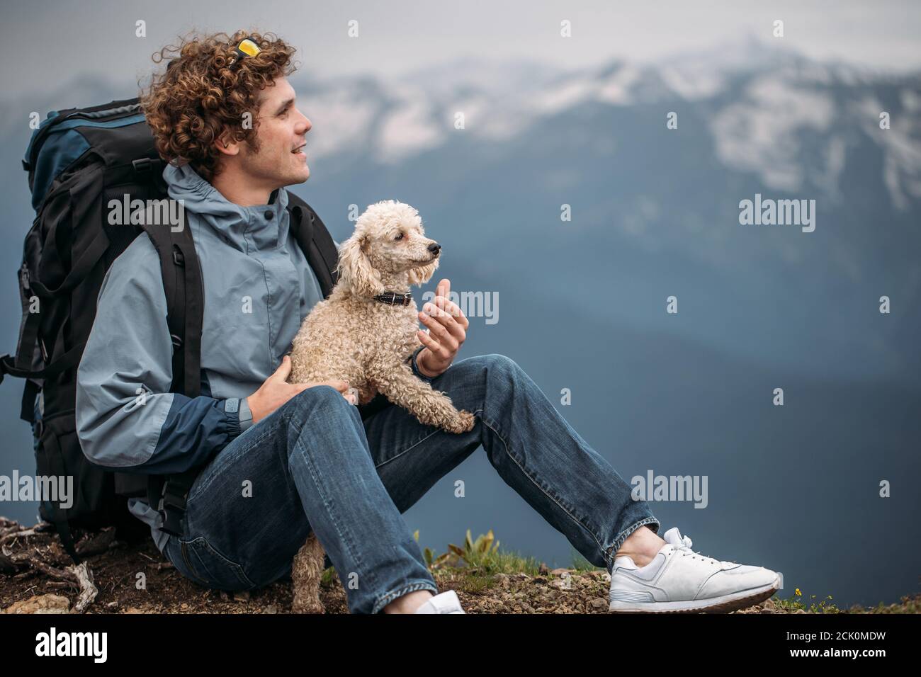 young attractive man with his best friend are spending holidays on the ...