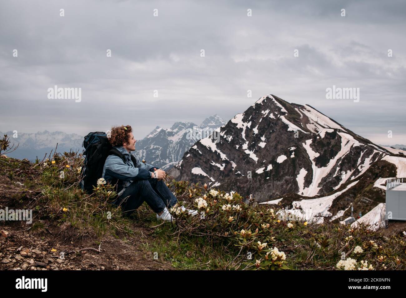 positive guy loves his motherland. house, landscape, idyll concept ...